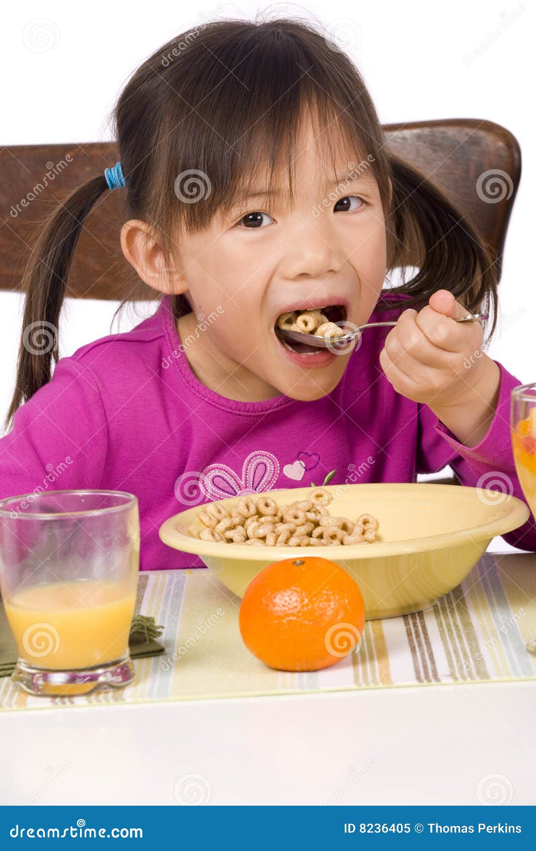 Eating Breakfast stock image. Image of childhood, smiling - 8236405