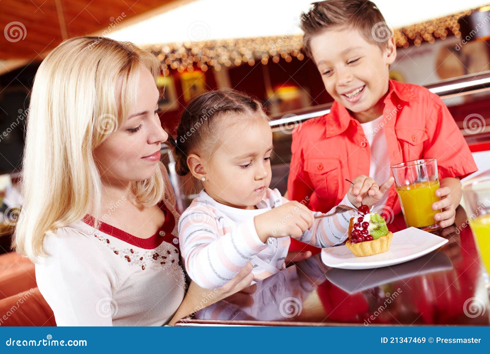 Eating in cafe stock image. Image of mother, juice, cupcake - 21347469