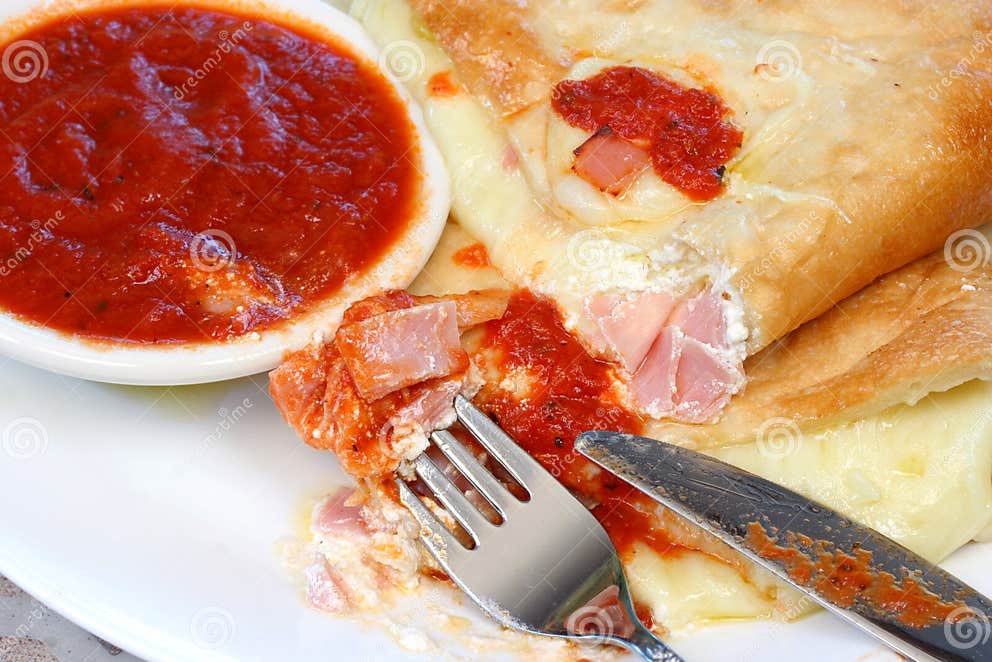 Eating Calzone stock photo. Image of italian, parmesan - 5860654