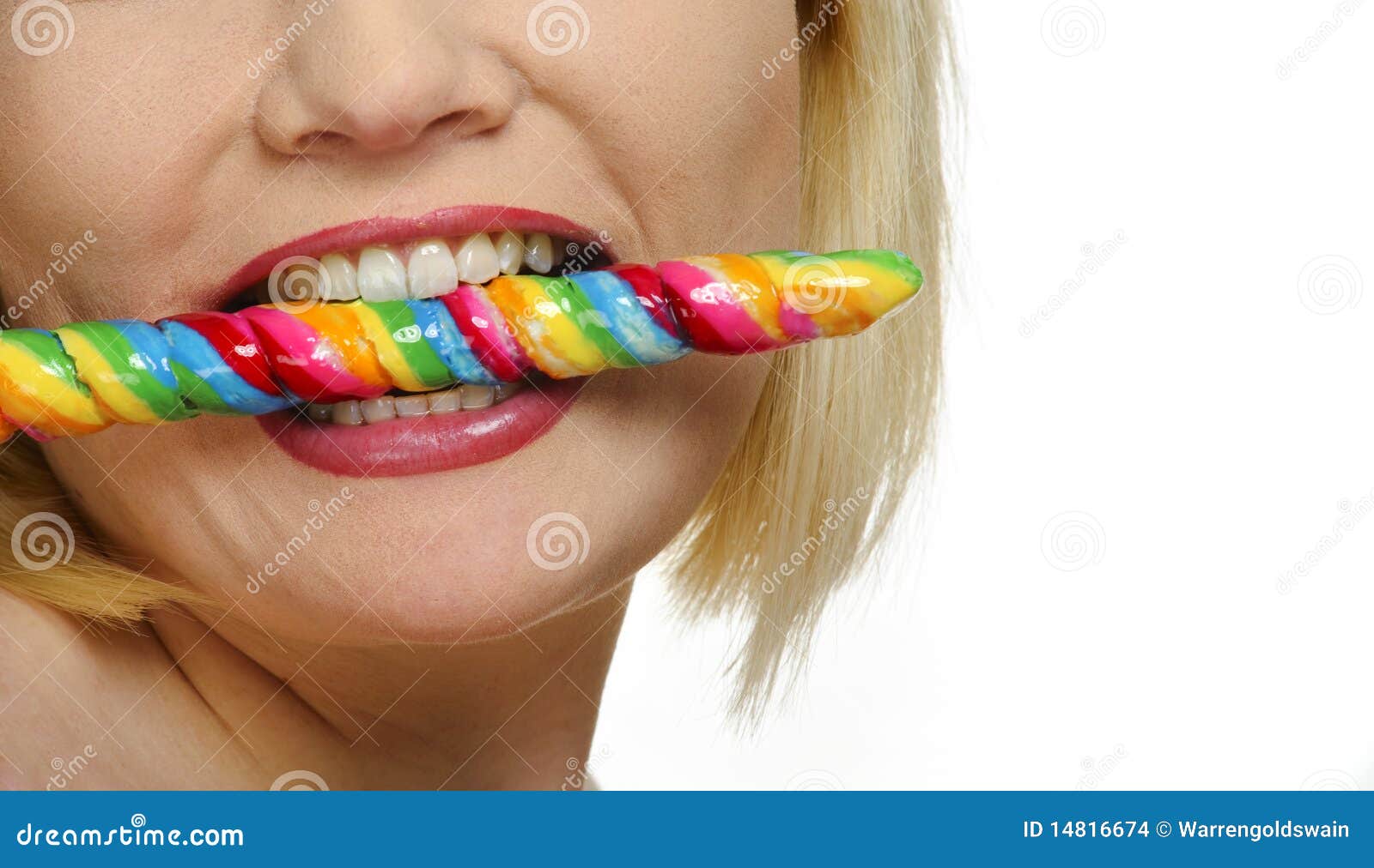 Eating candy stock photo. Image of vibrant, blond, face - 14816674