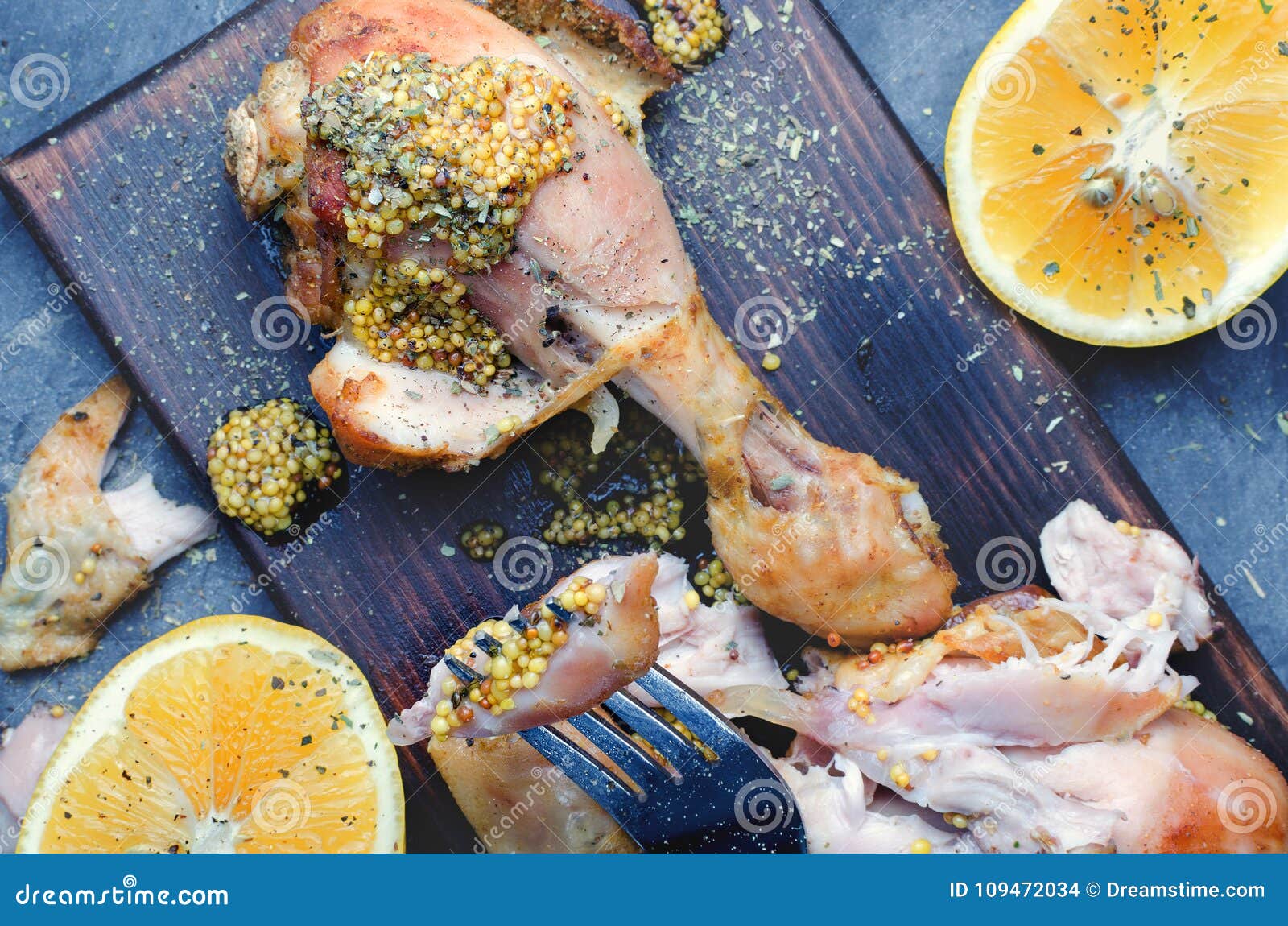 Eating chicken legs stock photo. Image of lunch, black - 109472034