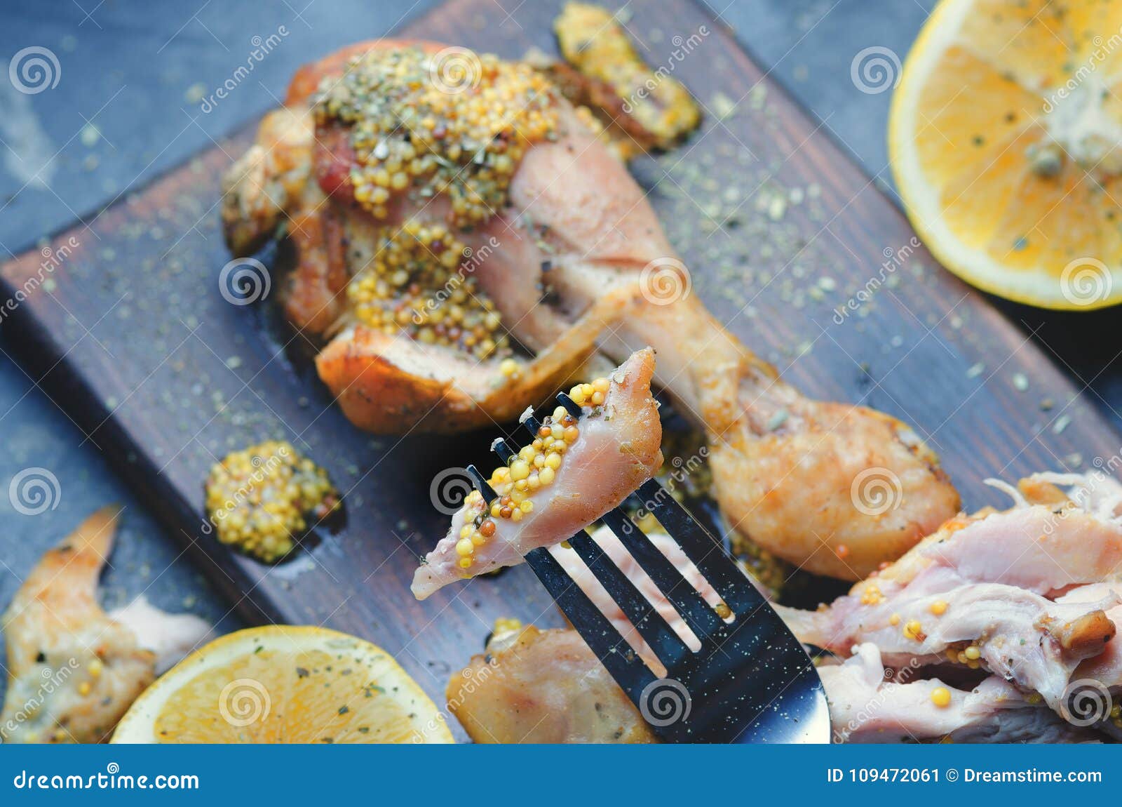 Eating chicken legs stock image. Image of board, roast - 109472061