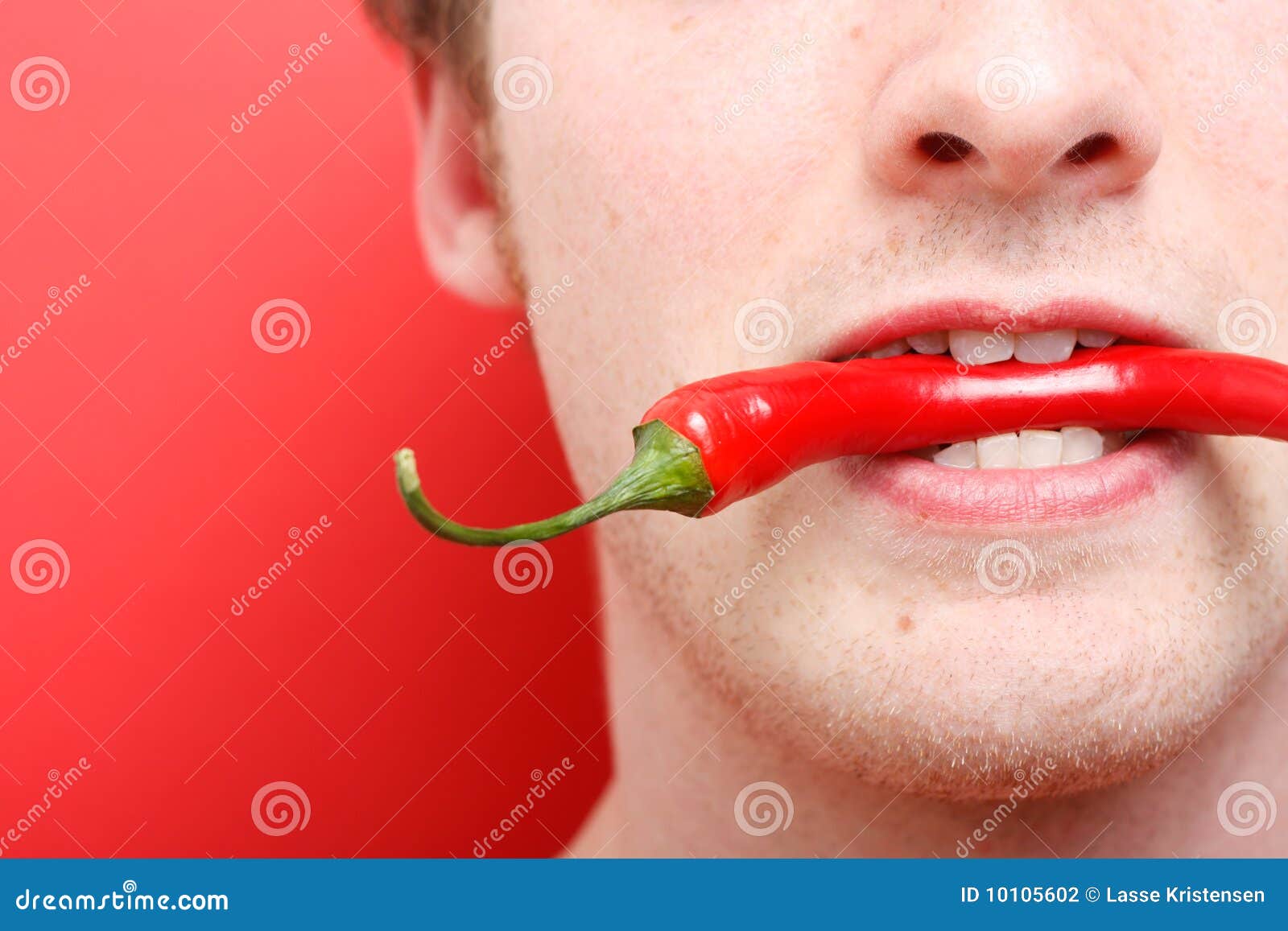 Eating chili pepper stock photo. Image of spicy, mouth - 10105602