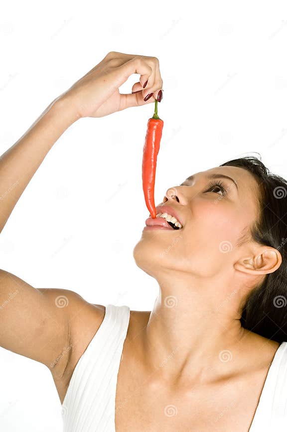 Eating Chilli stock image. Image of adult, beautiful, hair - 3192161