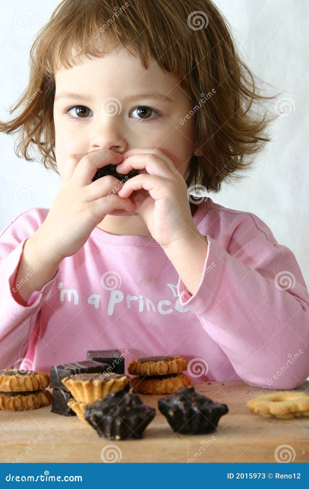 Eating chocolate cakes stock image. Image of unhealthy - 2015973