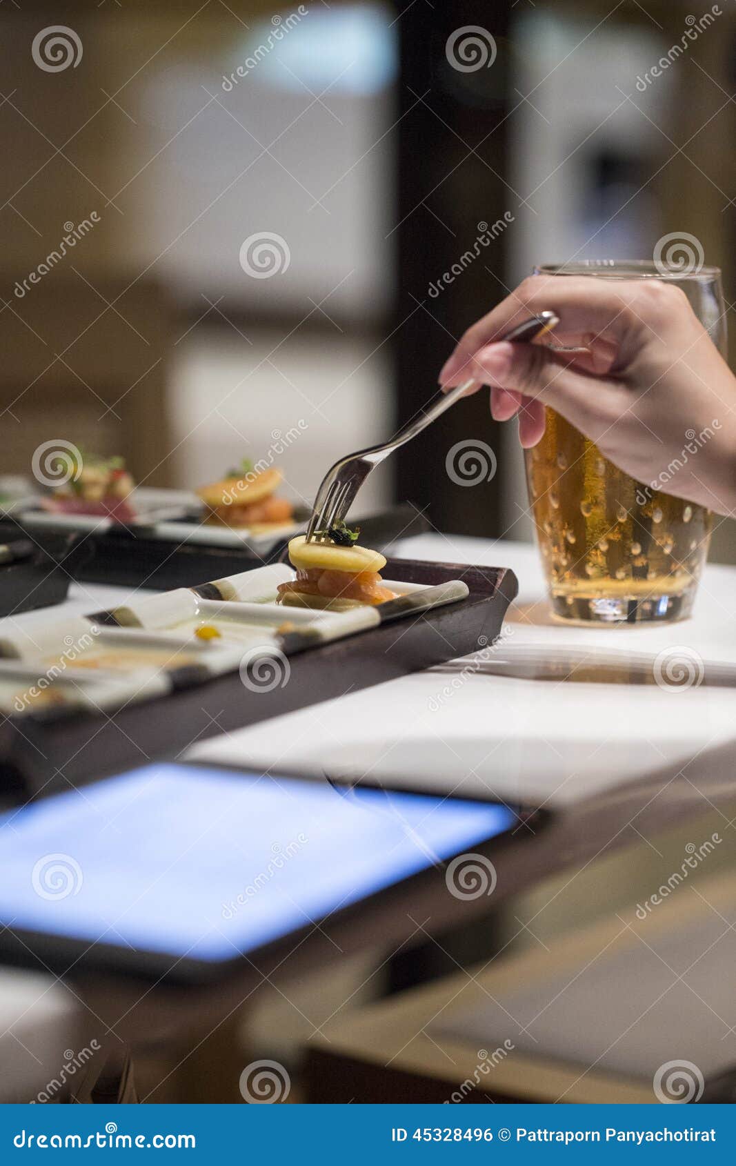 Eating Cocktail Food with Fork Stock Photo - Image of nails, fish: 45328496