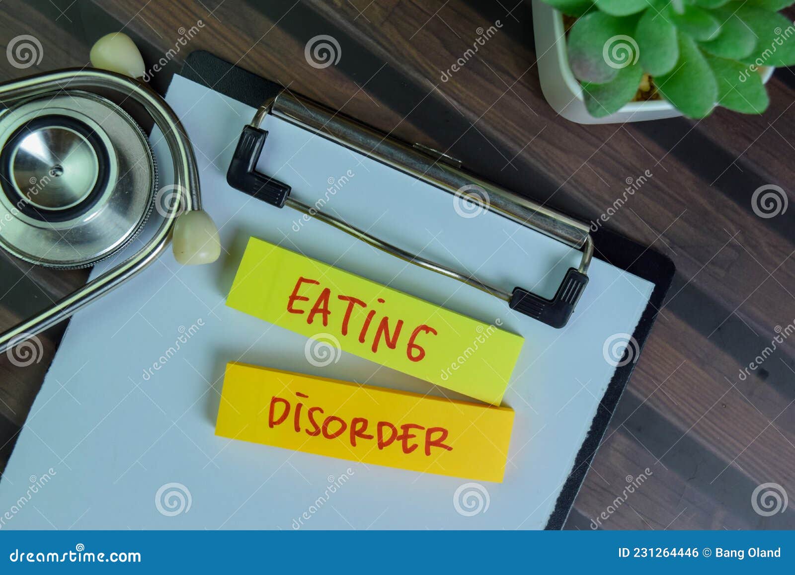 Eating Disorder Write on Sticky Notes Isolated on Wooden Table Stock ...