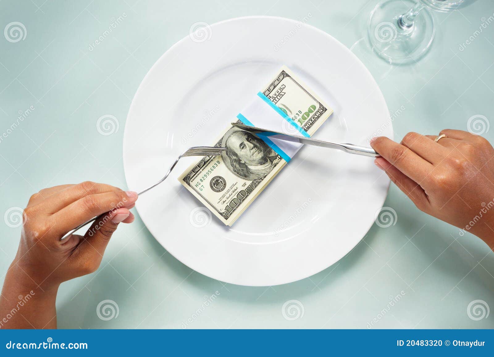 Eating the dollar bills stock photo. Image of cost, table - 20483320
