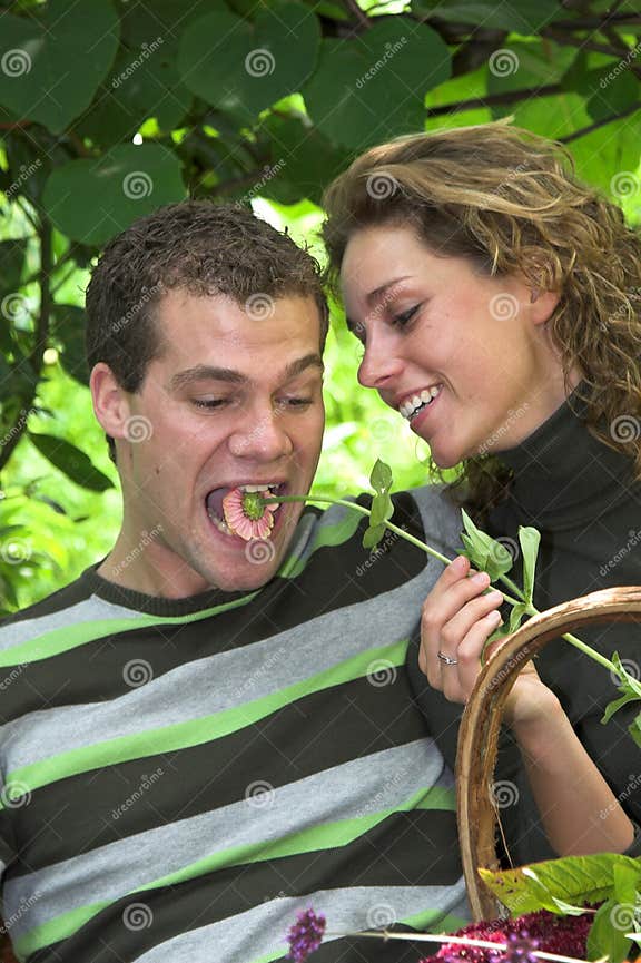 Eating a flower stock image. Image of marriage, couple - 1110363