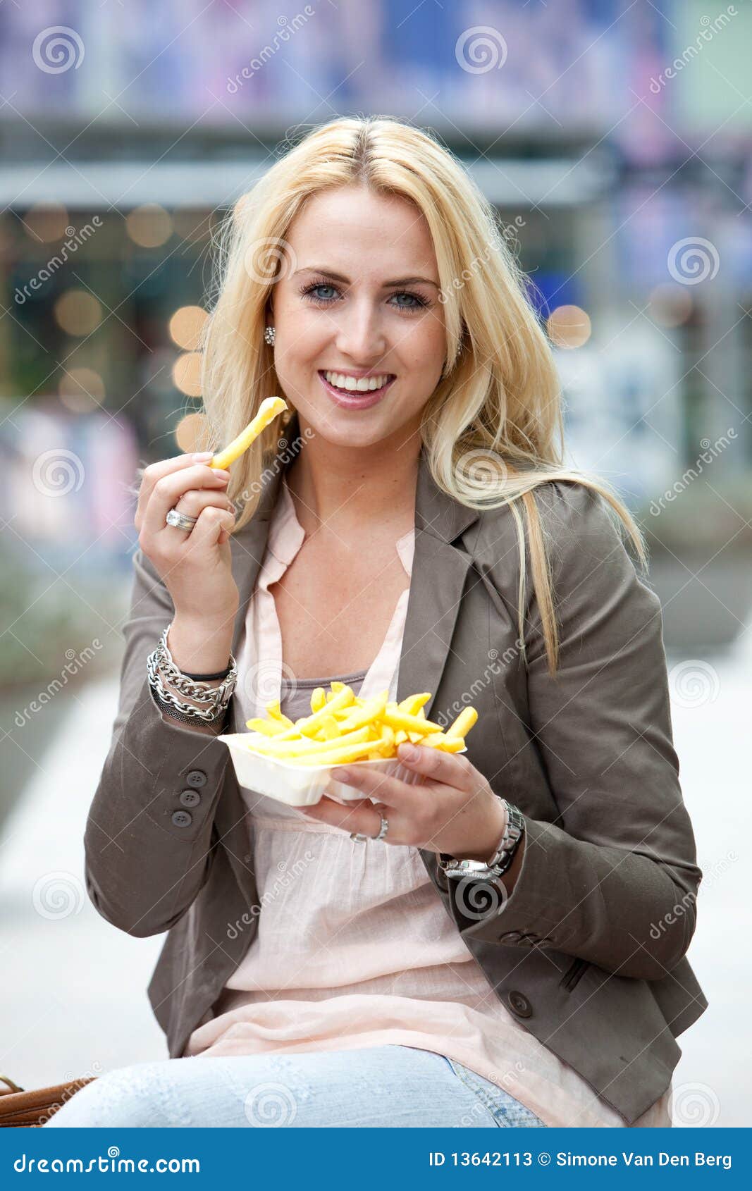 Eating fries stock image. Image of happy, snack, attractive - 13642113