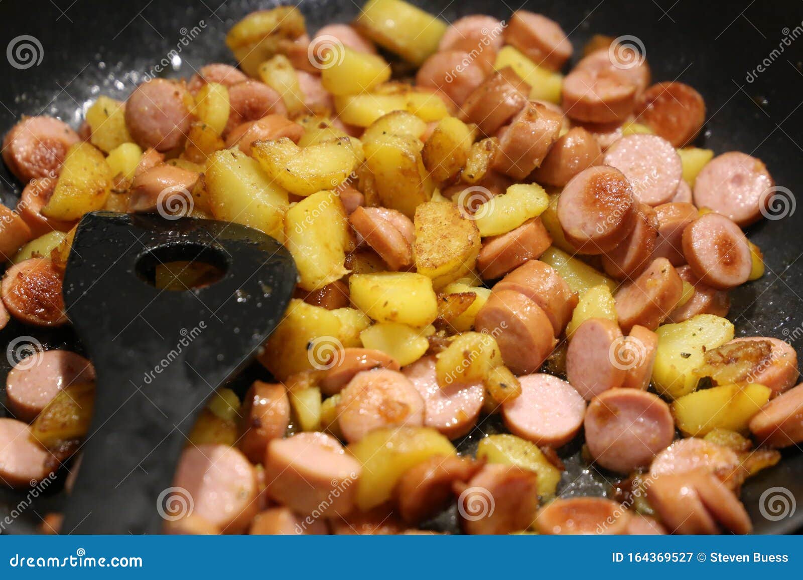 Eating in the frying pan stock image. Image of potatoes - 164369527