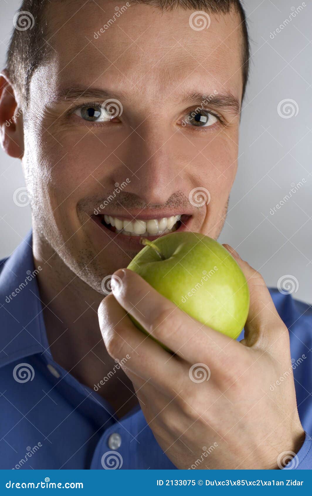 Eating a Green Apple stock image. Image of nutrition, organic - 2133075