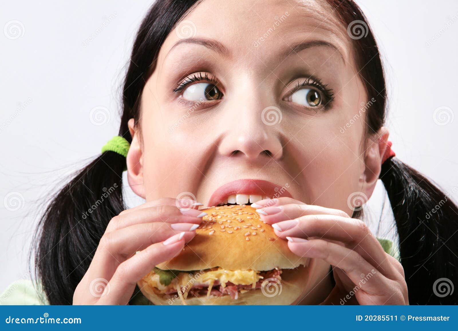 Eating hamburger stock image. Image of isolated, hungry - 20285511