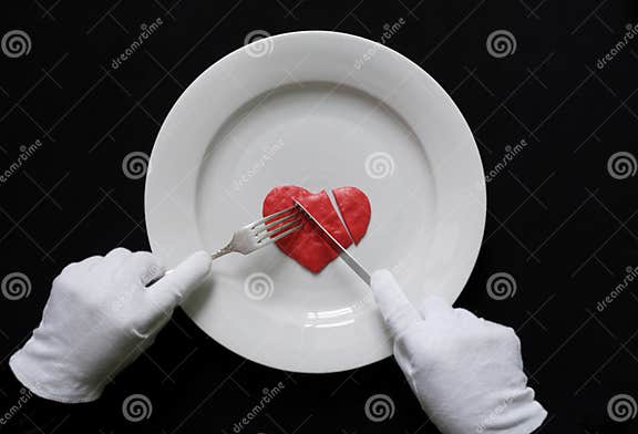 Eating of the human heart stock image. Image of household - 28683099