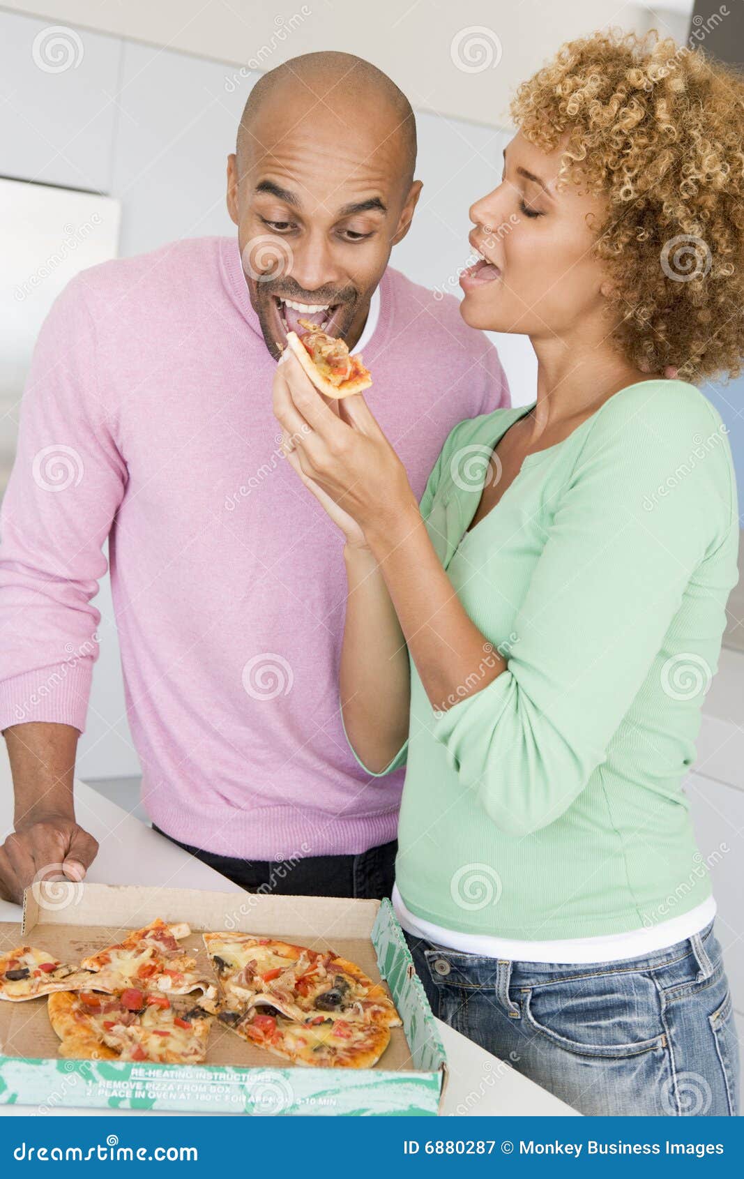 Eating husband pizza wife стоковое изображение. изображение ...