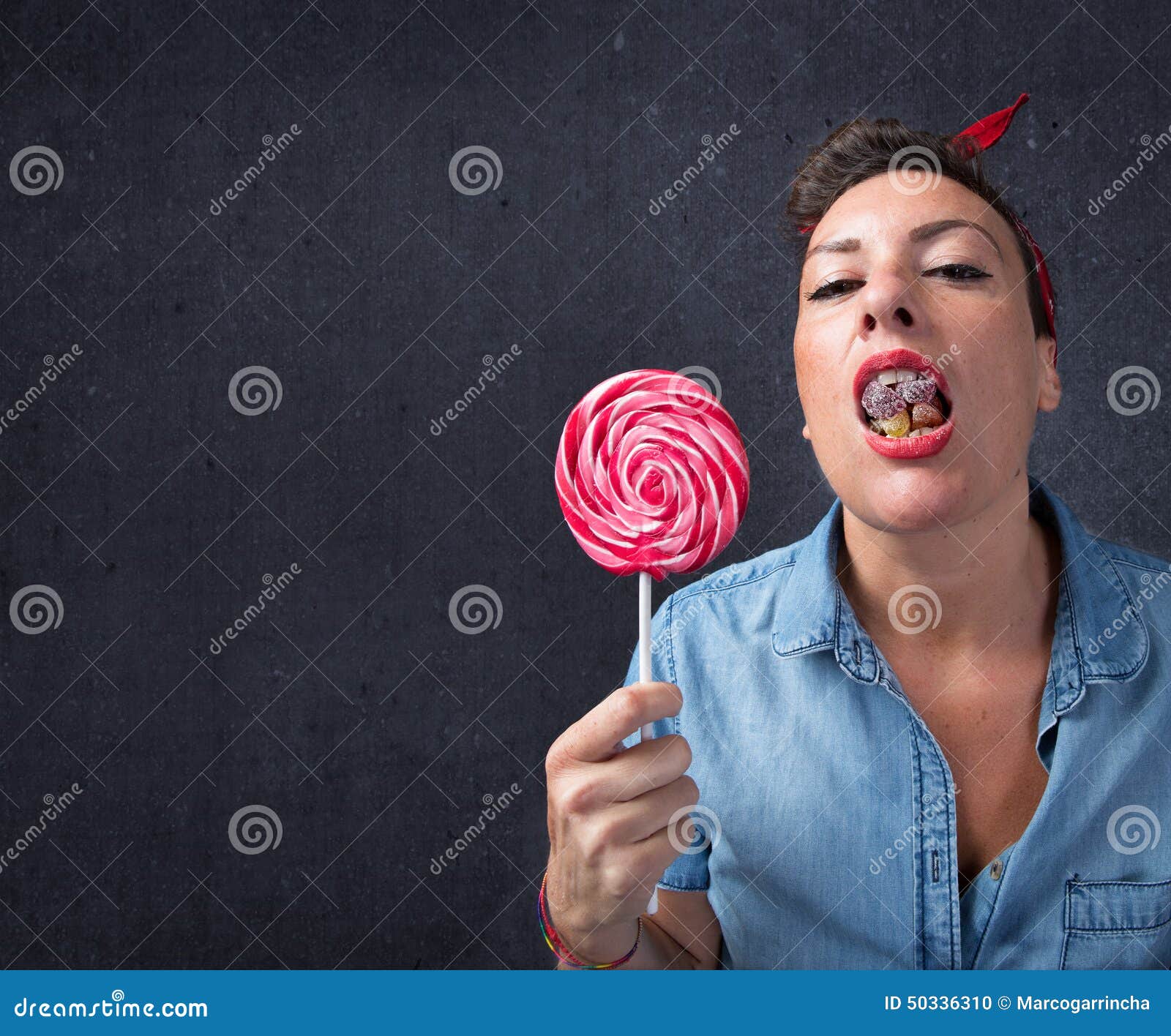 Eating a lot of candy stock photo. Image of unhealthy - 50336310