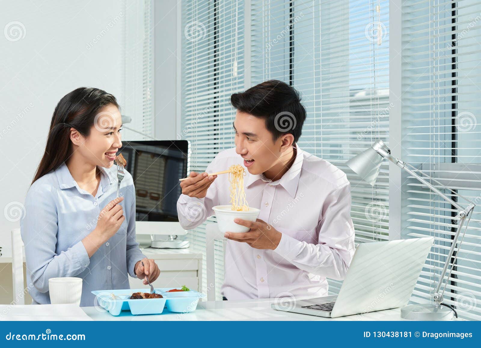 Eating lunch in office stock image. Image of male, vietnamese - 130438181