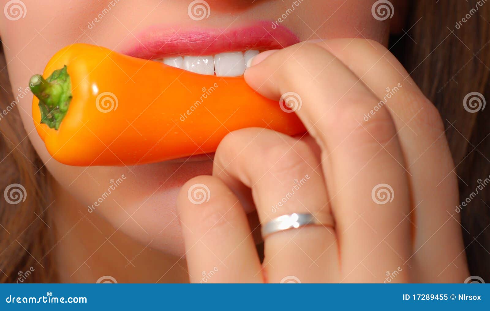 Eating a mini bell pepper stock image. Image of health - 17289455