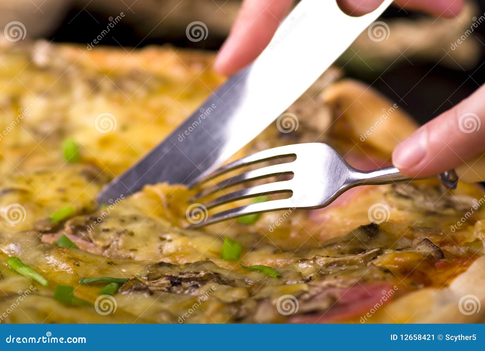 Eating piza stock image. Image of dinner, baked, knife - 12658421
