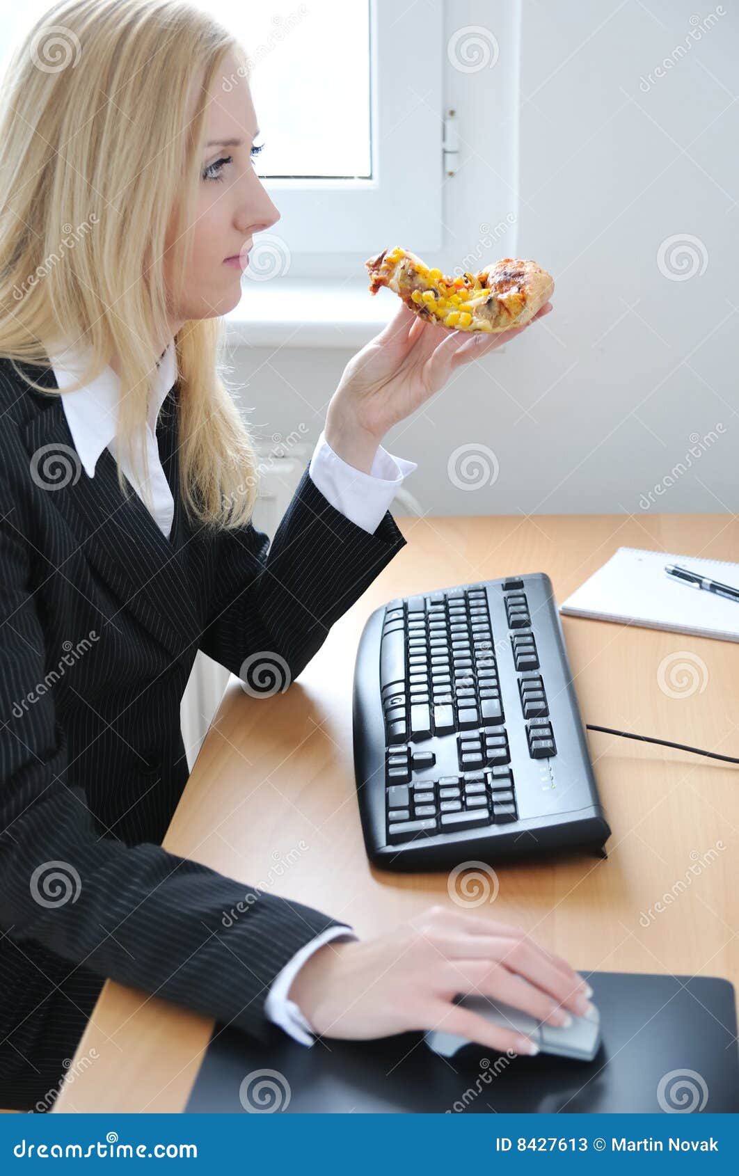 Eating pizza at work stock image. Image of hungry, caucasian - 8427613
