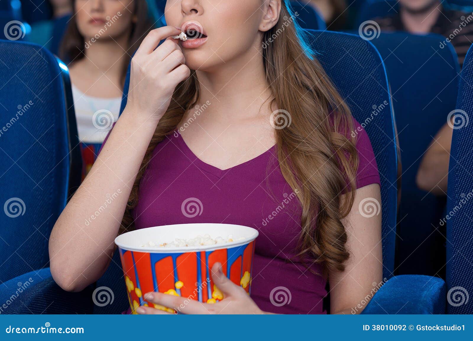 Eating Popcorn at the Cinema. Stock Photo - Image of human, leisure ...