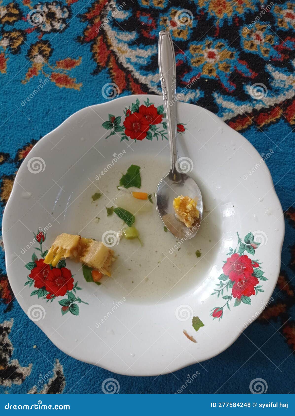 After Eating the Spinach with a Spoon and a Plate of Clear Broth Stock ...