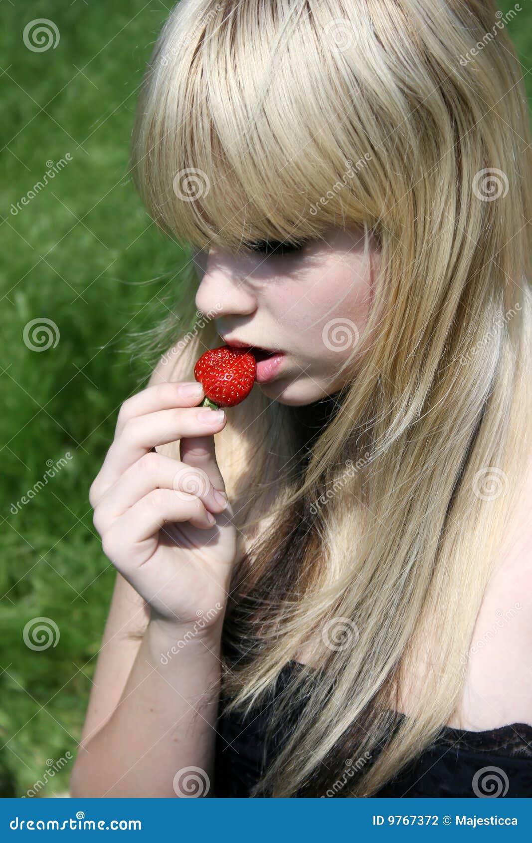Eating strawberry stock photo. Image of rock, food, feminine - 9767372