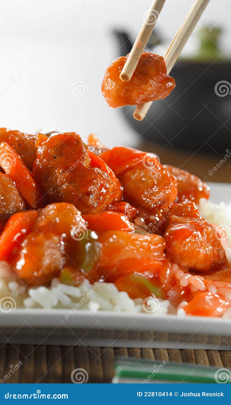Eating Sweet and Sour Chicken with Chopsticks Stock Photo - Image of ...