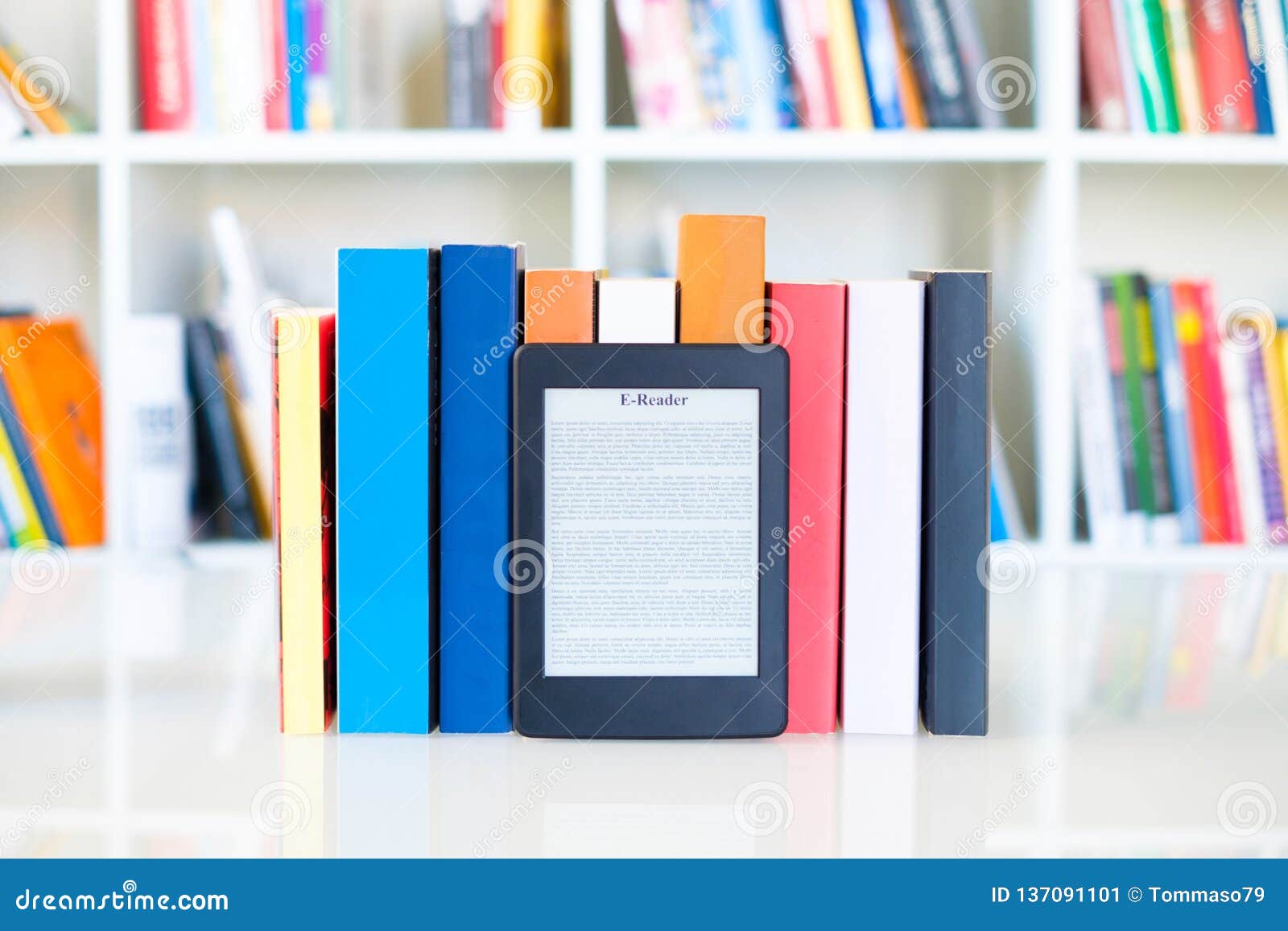 Ebook Reader and Paper Books on Bookshelf Background Stock Image ...