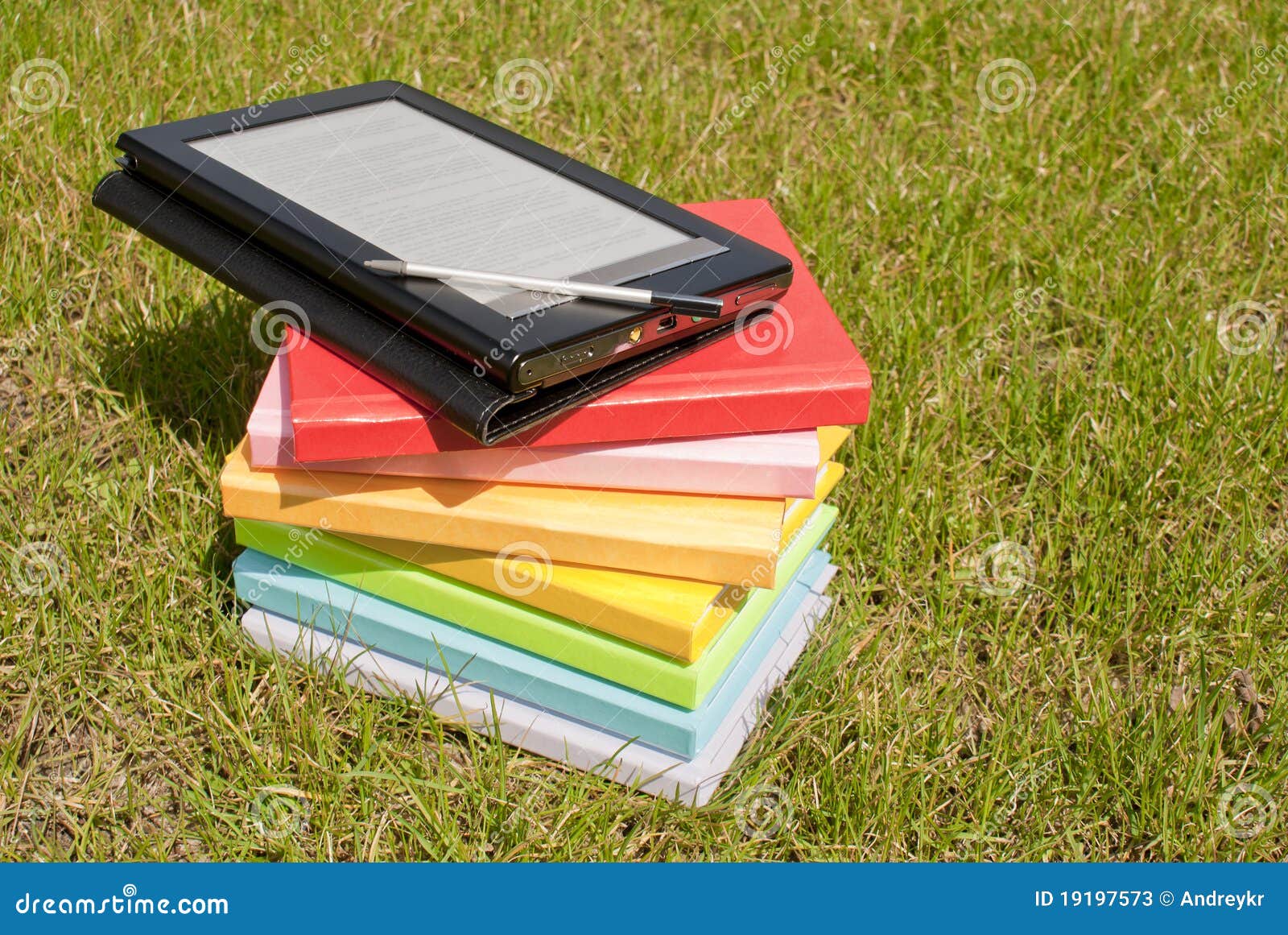 Ebook Reader with a Stack of Books Stock Image - Image of article ...