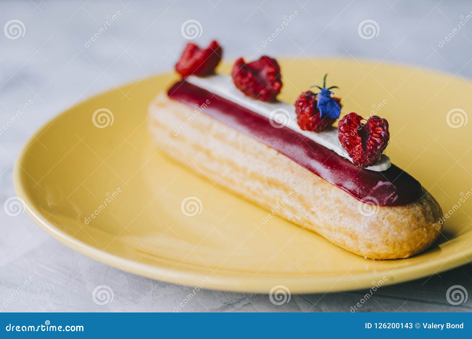 Eclair with Berries stock image. Image of brown, eclairs - 126200143
