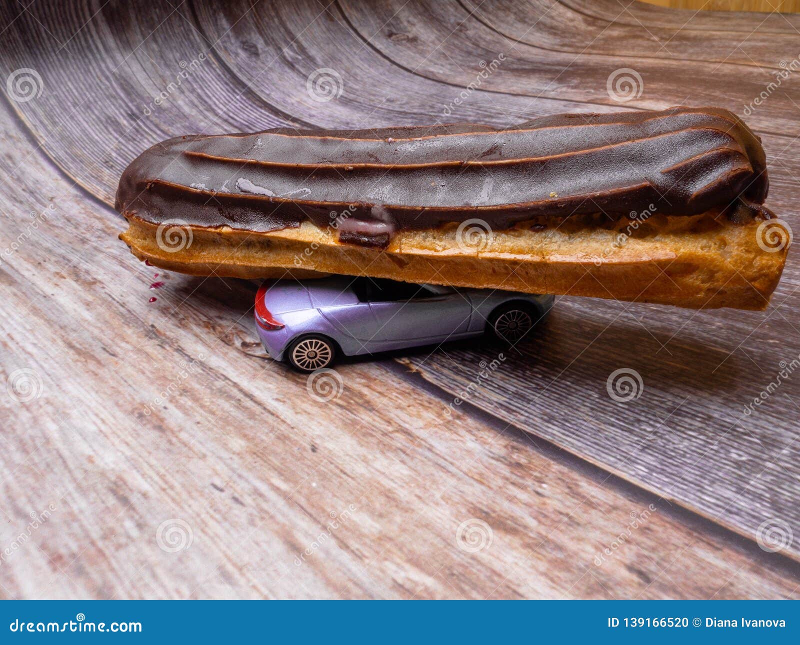 Eclair with Chocolate Fudge on a Car, Eclair Delivery Concept Stock ...