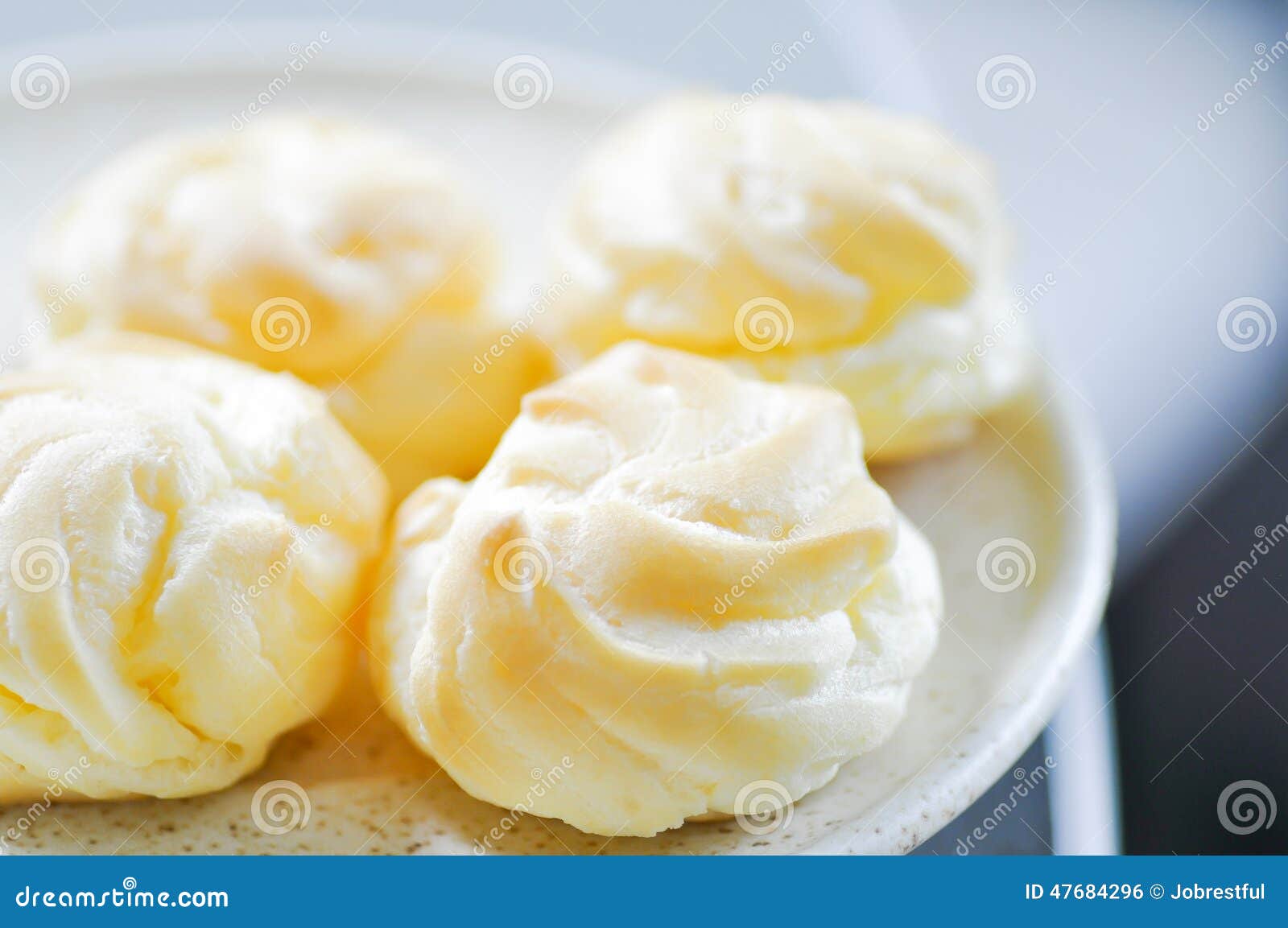 Eclair ,choux Cream,choux Pastry Stock Photo - Image of plate, doily ...