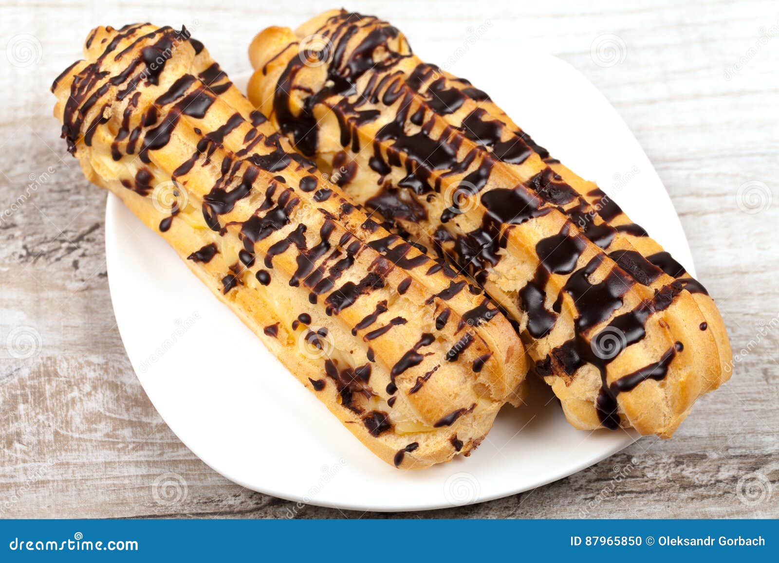 Eclair with custard stock photo. Image of black, icing - 87965850