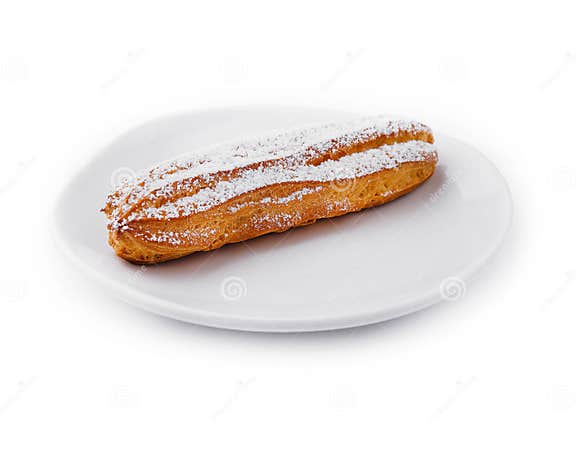 Eclair with Powdered Sugar on a Plate Stock Image - Image of cuisine ...