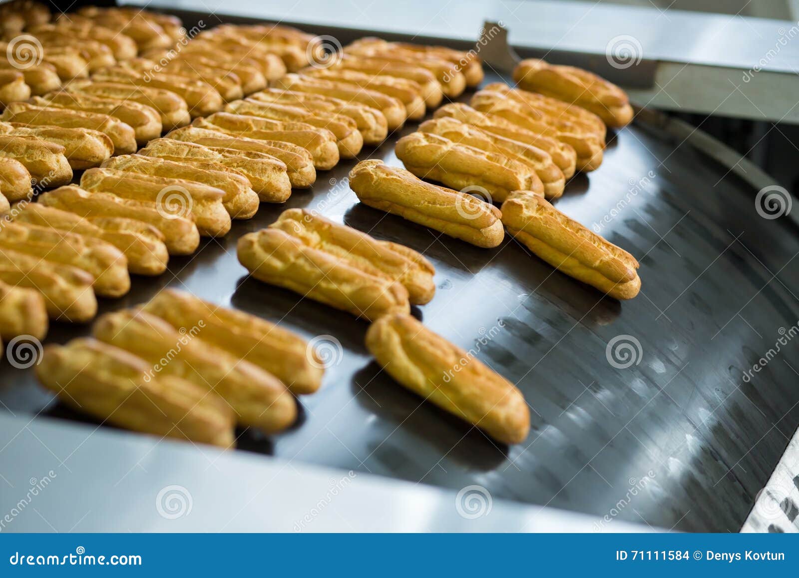 Eclair Shells on Conveyor Belt. Stock Photo - Image of equipment ...