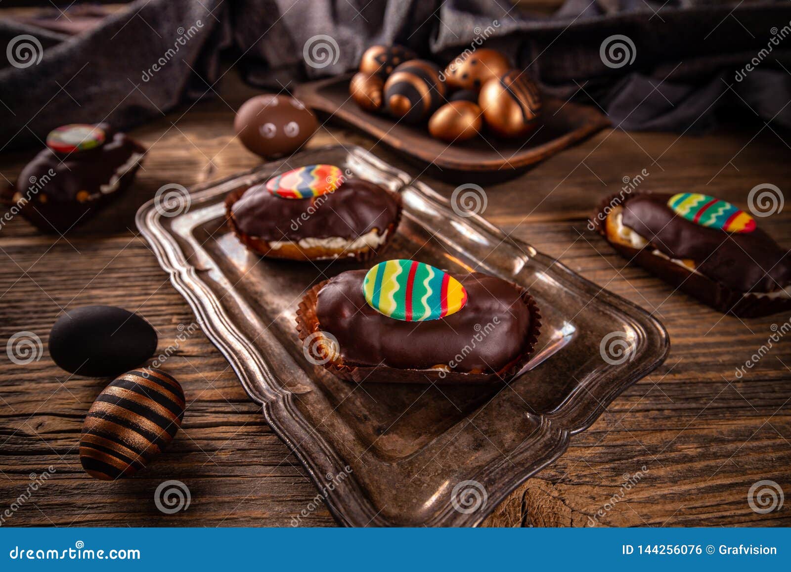 Eclairs With Chocolate Ganache Stock Photo | CartoonDealer.com #144256110
