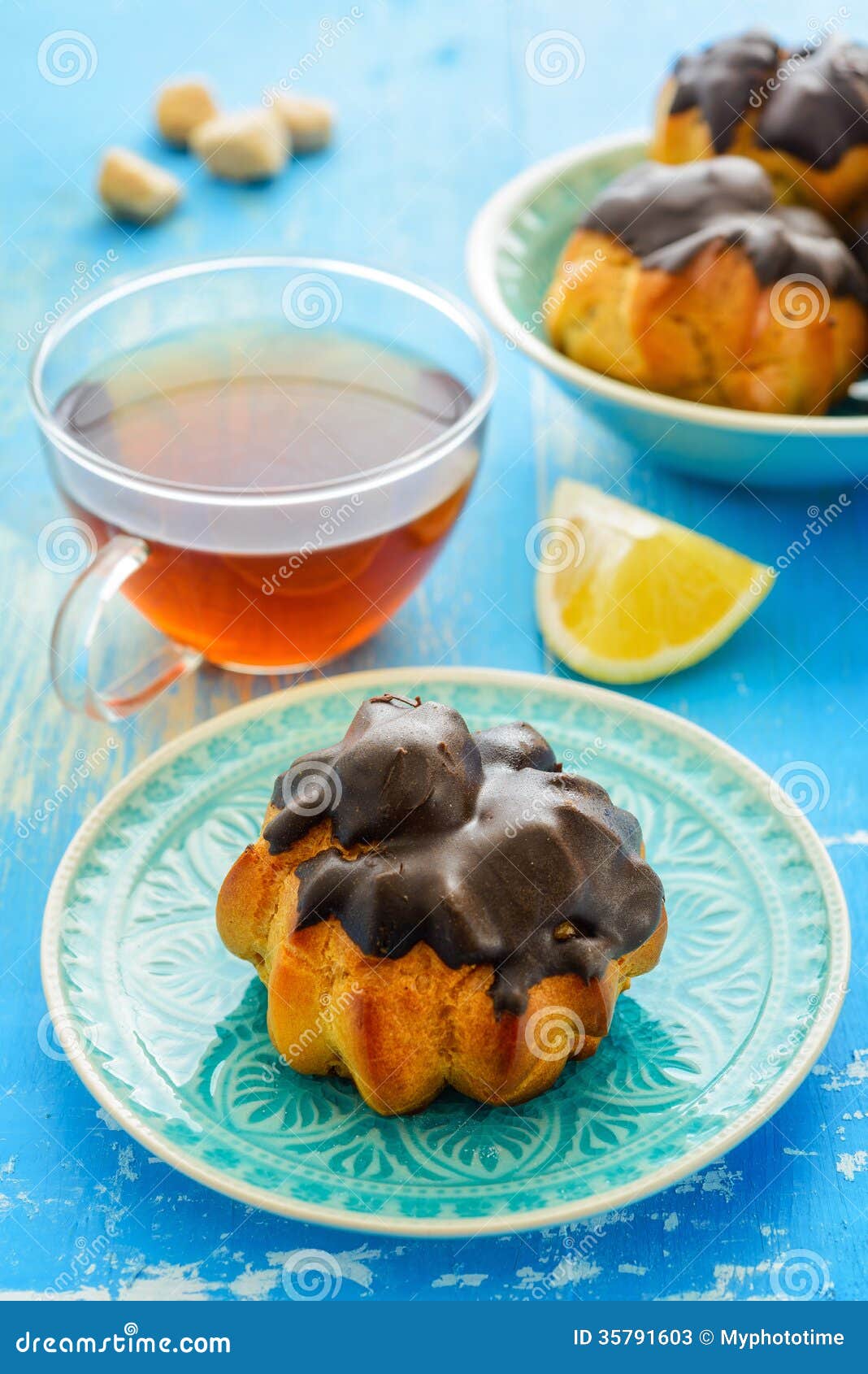 Eclairs, Cup of Tea and Lemon Stock Image - Image of calories, classic ...