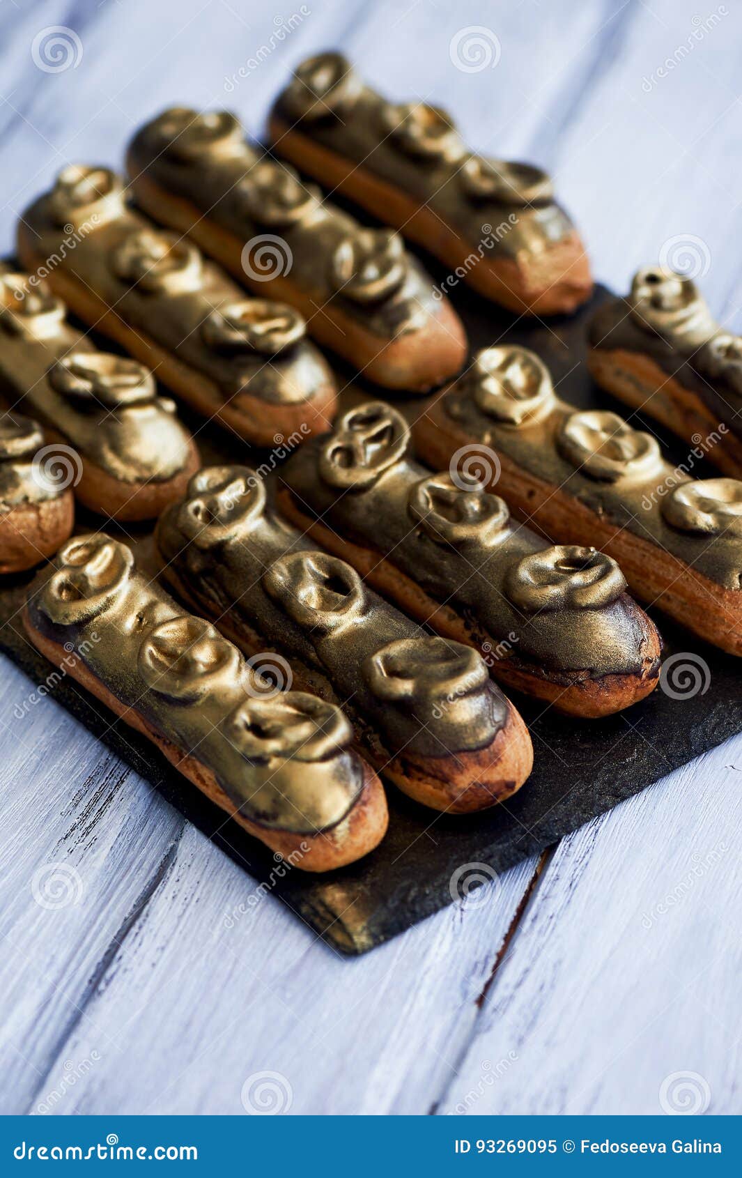 Eclairs, Filled with Golden Glaze.a Work of Culinary Art Stock Image ...