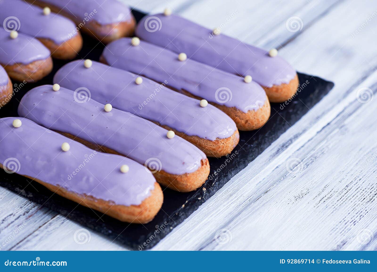 Eclairs, Filled with Purple Frosting. a Work of Culinary Art Stock ...