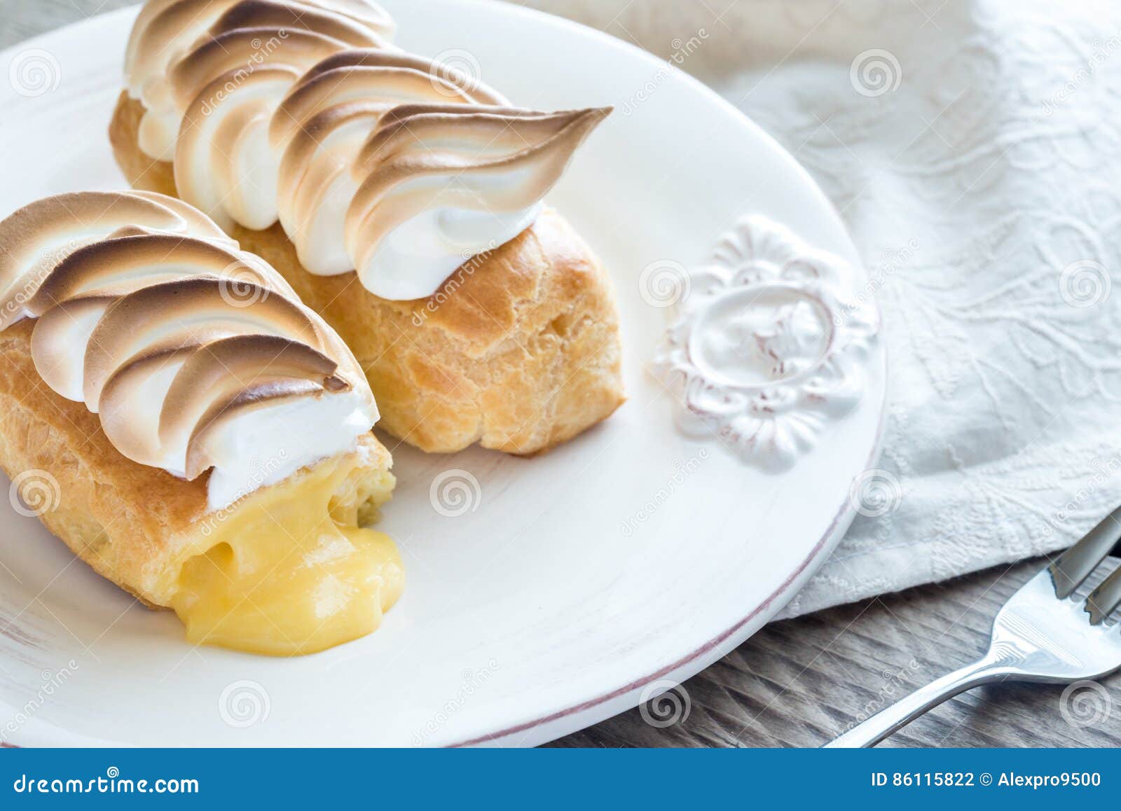 Eclairs with Lemon Curd and Meringue Stock Photo - Image of marmalade ...