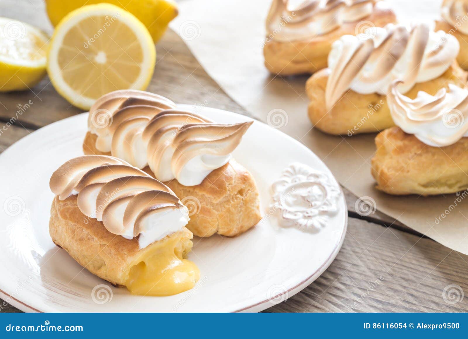 Eclairs with Lemon Curd and Meringue Stock Photo - Image of cake ...
