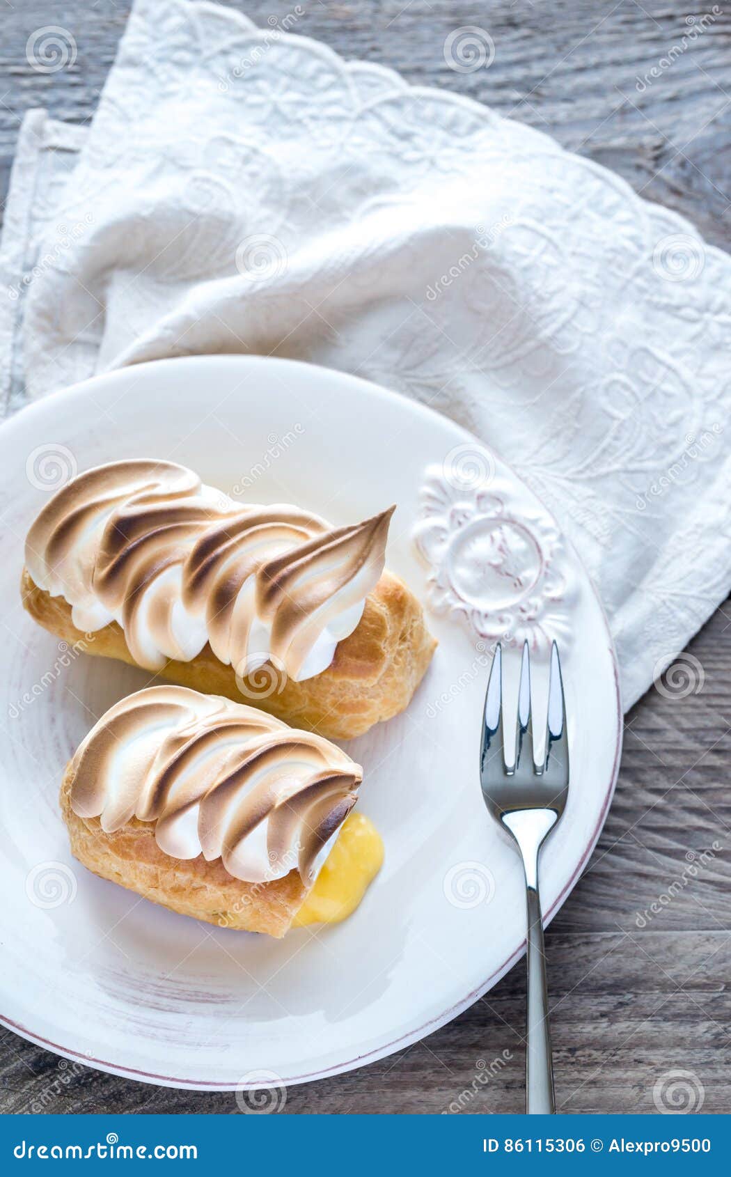 Eclairs with Lemon Curd and Meringue Stock Photo - Image of choux ...