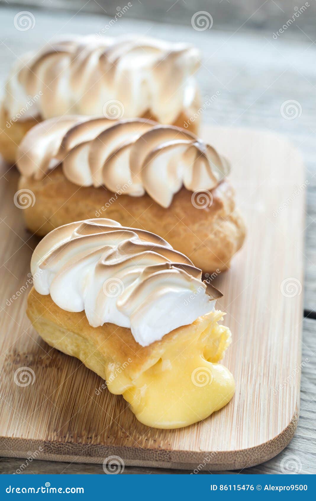 Eclairs with Lemon Curd and Meringue Stock Photo - Image of meringue ...