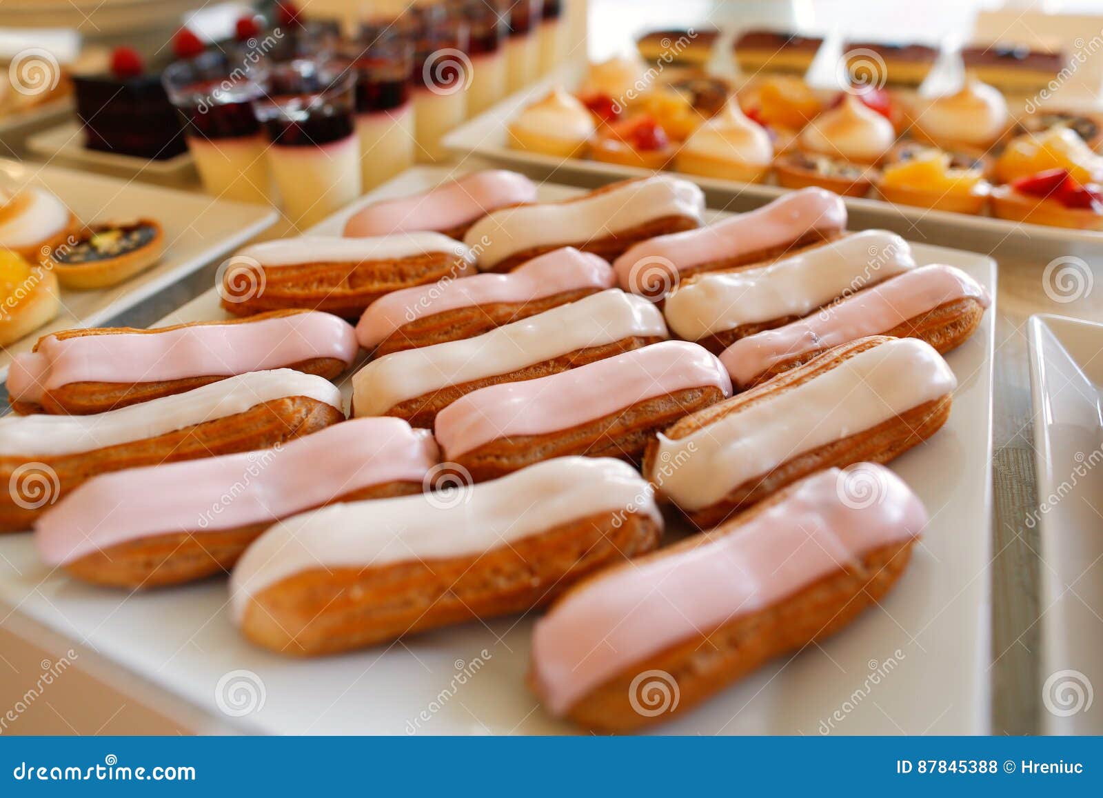 Eclairs on a Plate, Selective Focus Stock Photo - Image of desserts ...