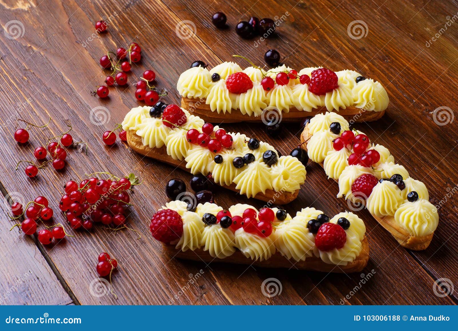 Eclairs on the Wooden Table Stock Photo - Image of cooking, bakery ...