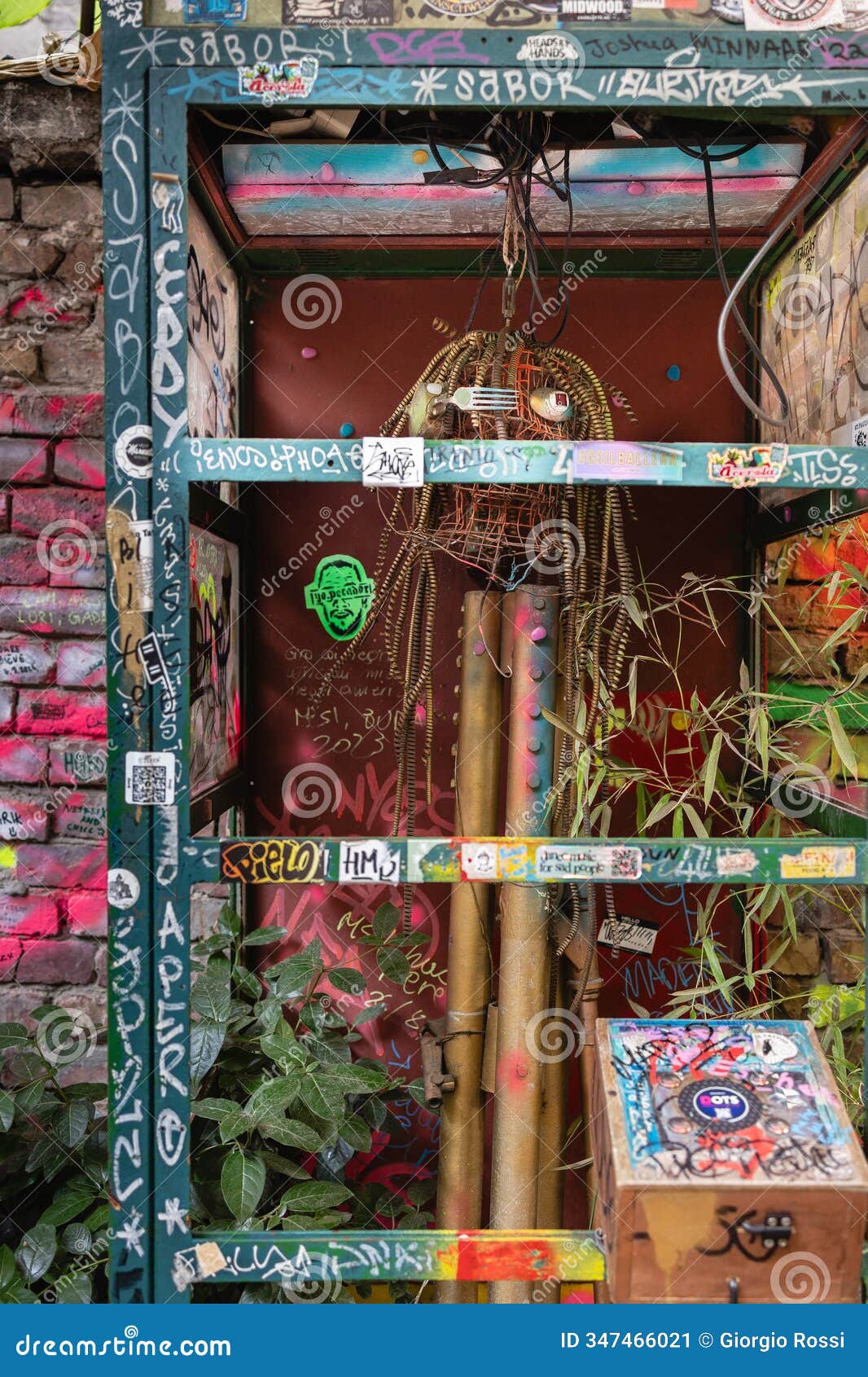 Eclectic Street Art Display, Intriguing Assemblage of Objects in a ...