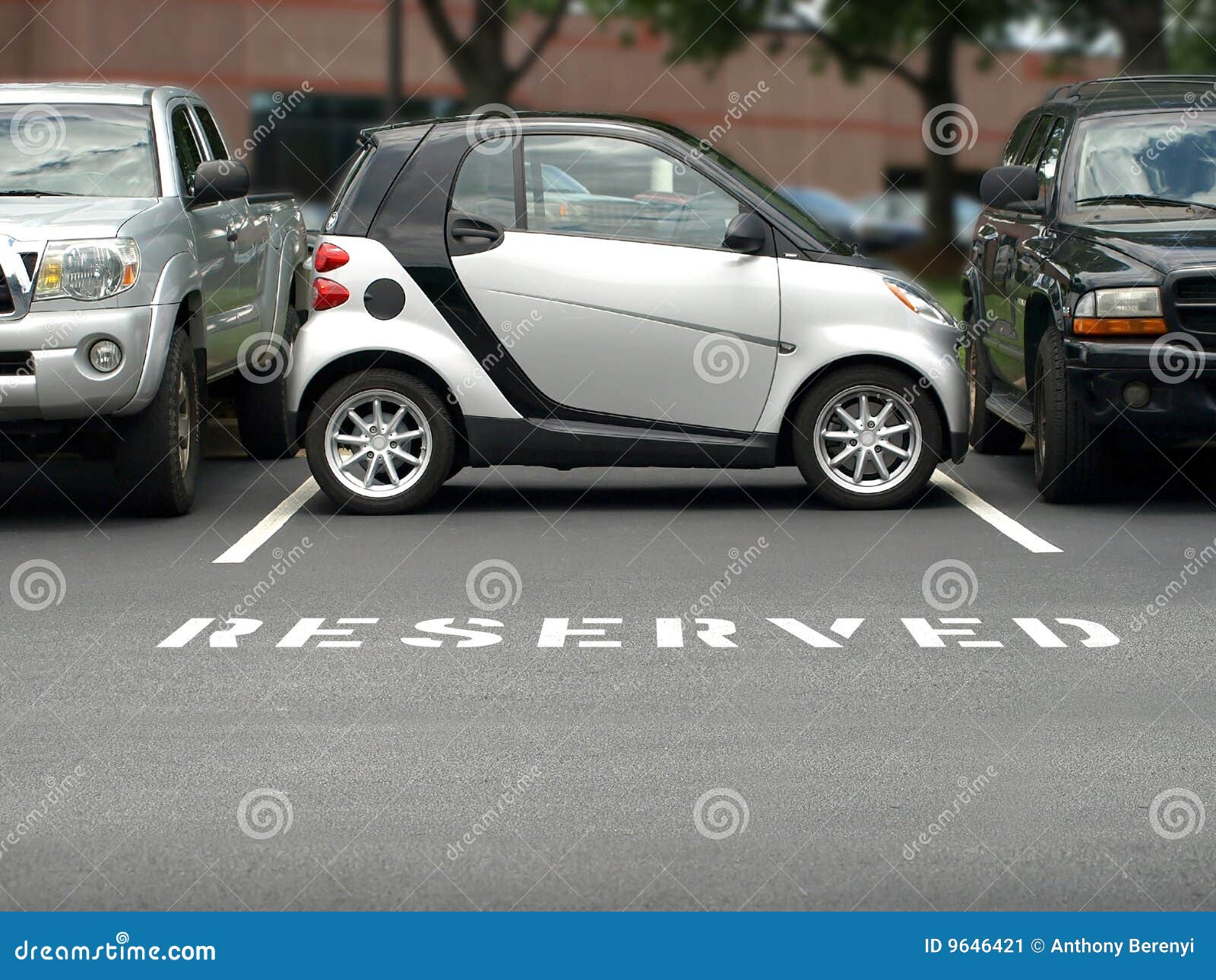 Eco Friendly Car Reserved between 2 Trucks Stock Image - Image of ...