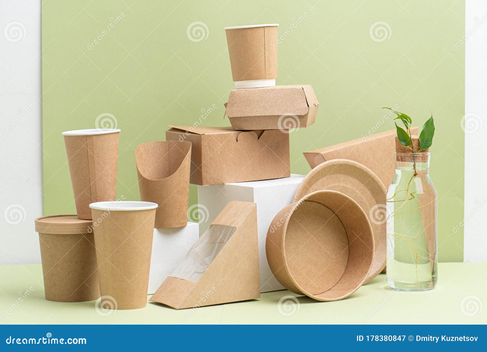 Eco-friendly Disposable Paper Containers for Food and Drinks Over Green ...