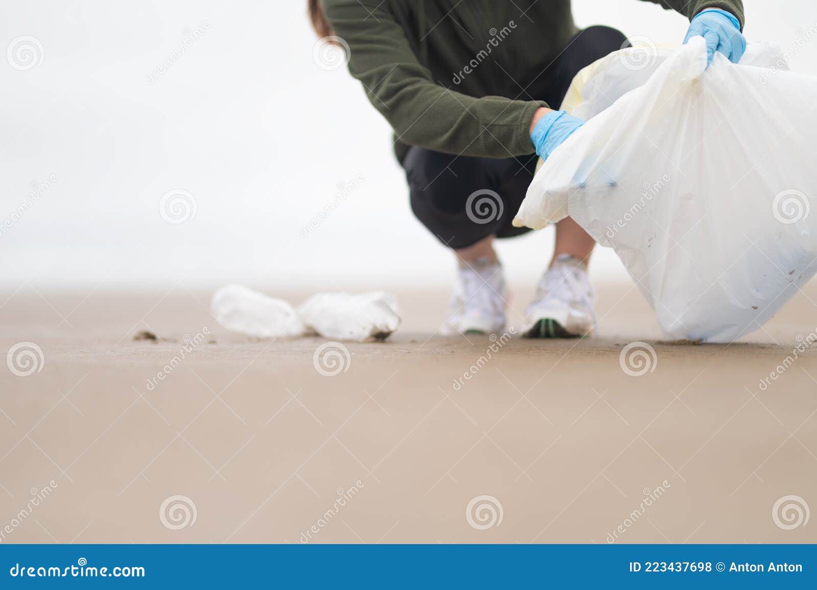 Ecological Problem. Environmental Pollution. a Volunteer Puts Garbage ...